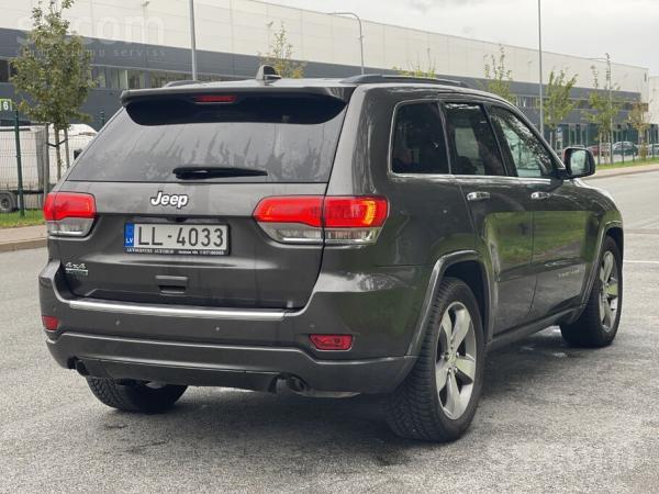 Melns Jeep Grand Cherokee 2015 Rīga, ar dzinēja tilpumu 3.00 L un nobraukumu 291 tūkst. km par 11300 €, foto 5 vietnē AUTOMOTO.COM.LV
