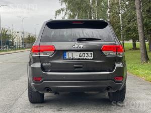 Black Jeep Grand Cherokee 2015 in Riga, with an engine capacity of 3.00 L and mileage of 291 thousand km for 11300 €, photo 7 on AUTOMOTO.COM.LV