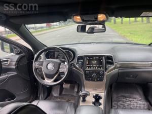 Black Jeep Grand Cherokee 2015 in Riga, with an engine capacity of 3.00 L and mileage of 291 thousand km for 11300 €, photo 14 on AUTOMOTO.COM.LV
