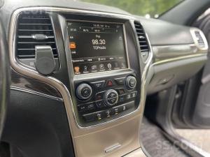 Black Jeep Grand Cherokee 2015 in Riga, with an engine capacity of 3.00 L and mileage of 291 thousand km for 11300 €, photo 20 on AUTOMOTO.COM.LV