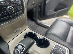 Black Jeep Grand Cherokee 2015 in Riga, with an engine capacity of 3.00 L and mileage of 291 thousand km for 11300 €, photo 21 on AUTOMOTO.COM.LV