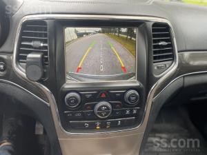 Black Jeep Grand Cherokee 2015 in Riga, with an engine capacity of 3.00 L and mileage of 291 thousand km for 11300 €, photo 23 on AUTOMOTO.COM.LV