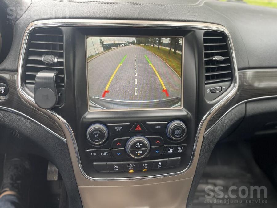 Black Jeep Grand Cherokee 2015 in Riga, with an engine capacity of 3.00 L and mileage of 291 thousand km for 11300 €, photo 23 on AUTOMOTO.COM.LV