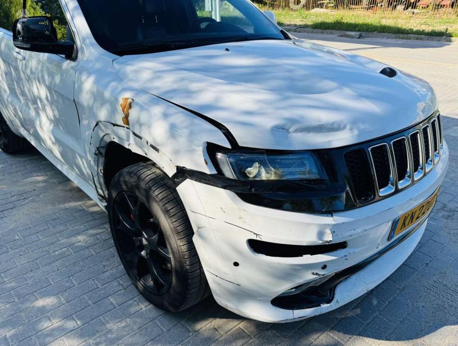 Black Jeep Grand Cherokee 2016 in Kaisiadorys, with an engine capacity of 6.40 L and mileage of 150 thousand km for 14950 €, photo 5 on AUTOMOTO.COM.LV