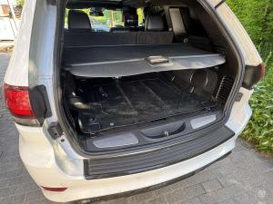 Black Jeep Grand Cherokee 2016 in Kaisiadorys, with an engine capacity of 6.40 L and mileage of 150 thousand km for 14950 €, photo 13 on AUTOMOTO.COM.LV