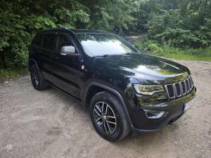 Black Jeep Grand Cherokee 2017 in Kaunas, with an engine capacity of 3.60 L and mileage of 225 thousand km for 17700 €, photo 4 on AUTOMOTO.COM.LV