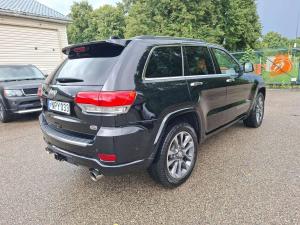 Black Jeep Grand Cherokee 2017 in Vilnius, with an engine capacity of 5.65 L and mileage of 149 thousand km for 20500 €, photo 4 on AUTOMOTO.COM.LV