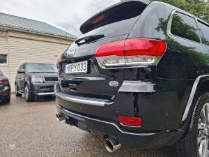Black Jeep Grand Cherokee 2017 in Vilnius, with an engine capacity of 5.65 L and mileage of 149 thousand km for 20500 €, photo 7 on AUTOMOTO.COM.LV