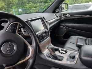 Black Jeep Grand Cherokee 2017 in Vilnius, with an engine capacity of 5.65 L and mileage of 149 thousand km for 20500 €, photo 13 on AUTOMOTO.COM.LV