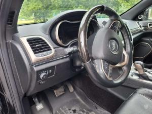 Black Jeep Grand Cherokee 2017 in Vilnius, with an engine capacity of 5.65 L and mileage of 149 thousand km for 20500 €, photo 14 on AUTOMOTO.COM.LV