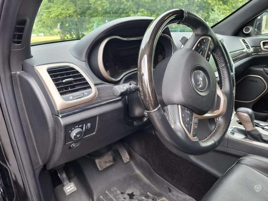 Black Jeep Grand Cherokee 2017 in Vilnius, with an engine capacity of 5.65 L and mileage of 149 thousand km for 20500 €, photo 14 on AUTOMOTO.COM.LV