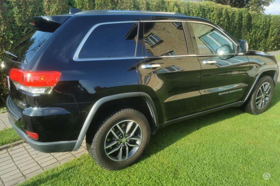 Melns Jeep Grand Cherokee 2017 Panevēža, ar dzinēja tilpumu 3.60 L un nobraukumu 261 tūkst. km par 13500 €, foto 4 vietnē AUTOMOTO.COM.LV