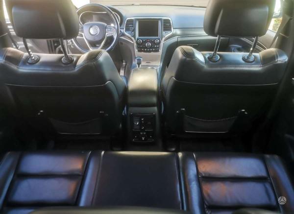 Jeep Grand Cherokee 2017 Panevēža vietnē Melns Jeep Grand Cherokee 2017 Panevēža, ar dzinēja tilpumu 3.60 L un nobraukumu 261 tūkst. km par 13500 €, foto 11 vietnē AUTOMOTO.COM.LV