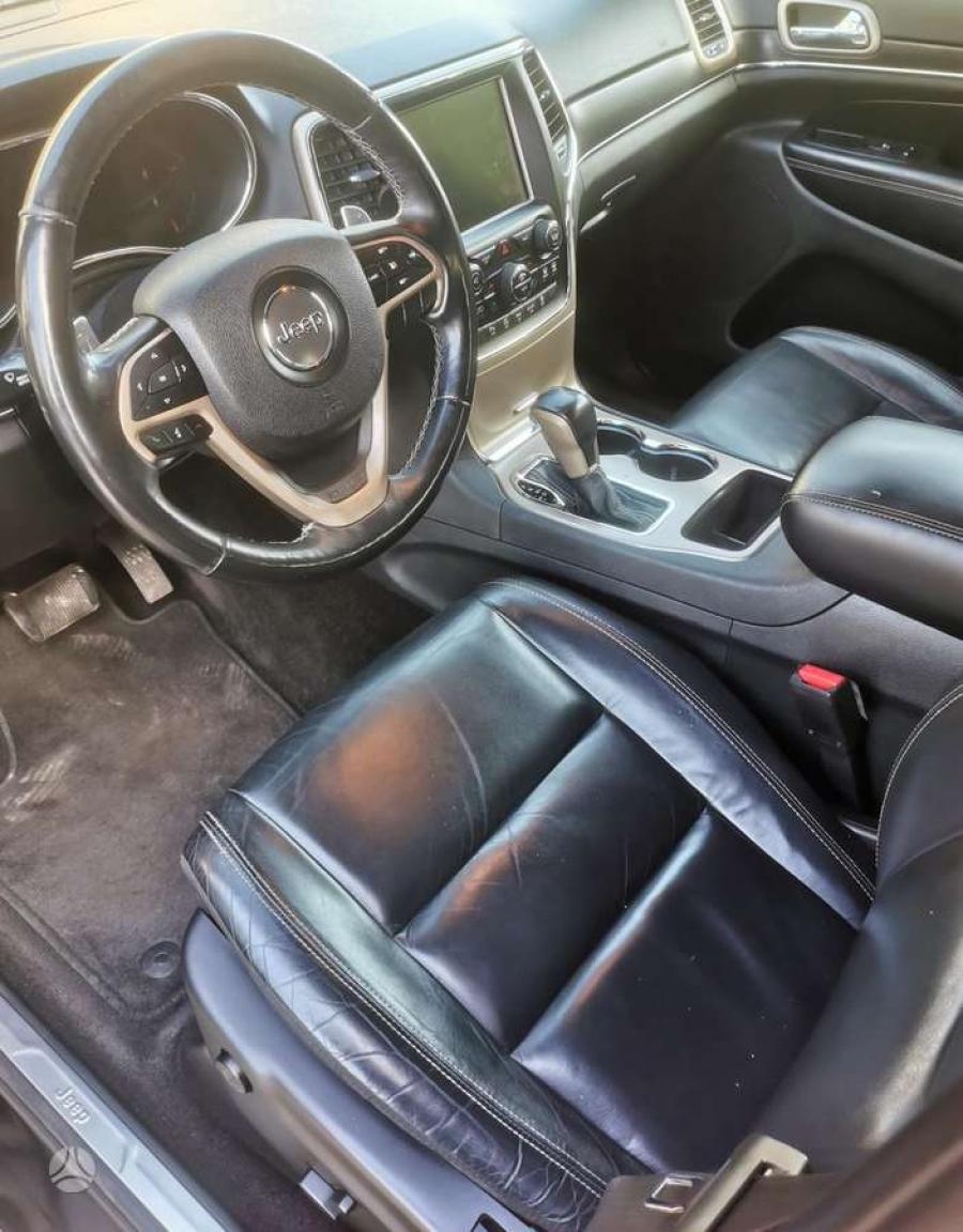 Melns Jeep Grand Cherokee 2017 Panevēža, ar dzinēja tilpumu 3.60 L un nobraukumu 261 tūkst. km par 13500 €, foto 12 vietnē AUTOMOTO.COM.LV
