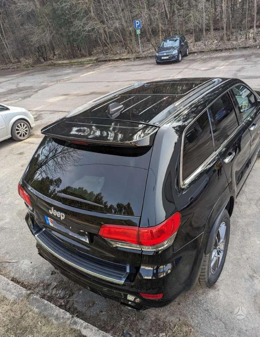 Black Jeep Grand Cherokee 2018 in Vilnius, with an engine capacity of 3.60 L and mileage of 125 thousand km for 21900 €, photo 7 on AUTOMOTO.COM.LV