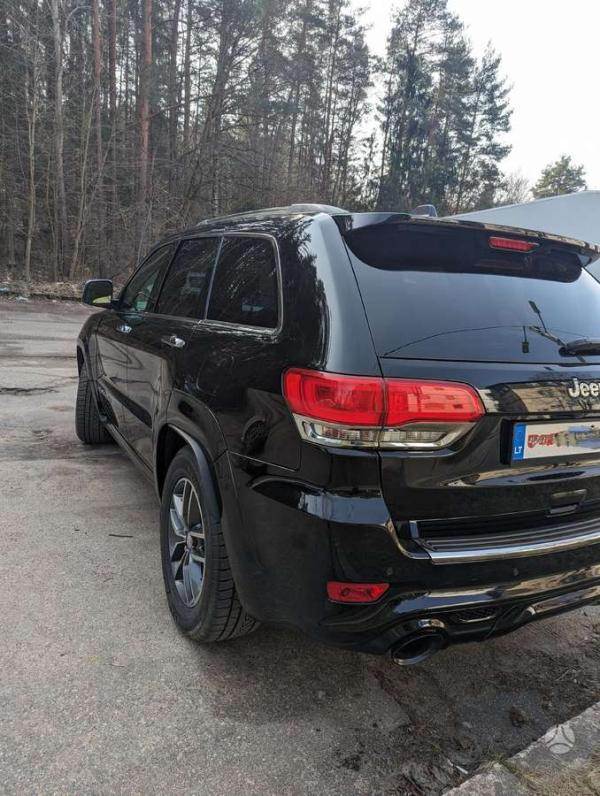 Black Jeep Grand Cherokee 2018 in Vilnius, with an engine capacity of 3.60 L and mileage of 125 thousand km for 21900 €, photo 8 on AUTOMOTO.COM.LV