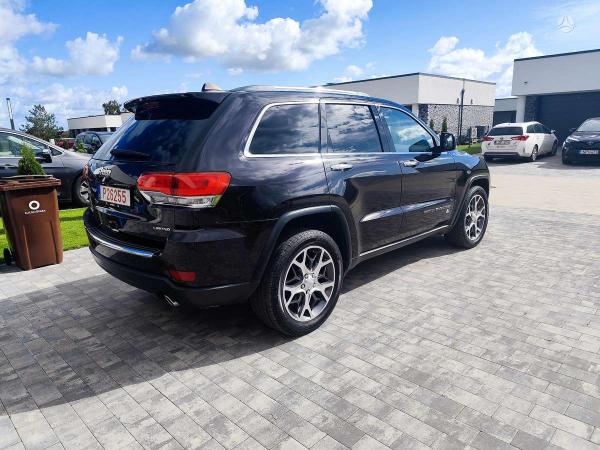 Black Jeep Grand Cherokee 2019 in Kaunas, with an engine capacity of 3.60 L and mileage of 148 thousand km for 18500 €, photo 6 on AUTOMOTO.COM.LV