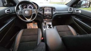 Black Jeep Grand Cherokee 2021 in Siauliai, with an engine capacity of 3.60 L and mileage of 79 thousand km for 21500 €, photo 11 on AUTOMOTO.COM.LV