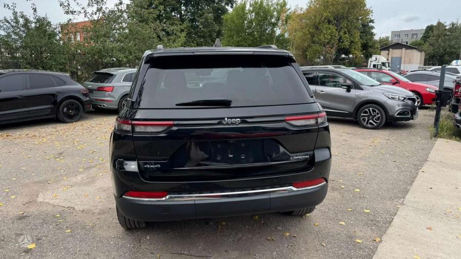 Black Jeep Grand Cherokee 2023 in Ukmerge, with an engine capacity of 3.60 L and mileage of 80 thousand km for 22990 €, photo 8 on AUTOMOTO.COM.LV