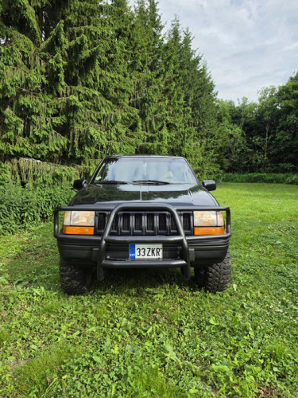 Melns Jeep Grand Cherokee 1995 Rakvere, ar dzinēja tilpumu 5.20 L un nobraukumu 316 tūkst. km par 5500 €, foto 6 vietnē AUTOMOTO.COM.LV