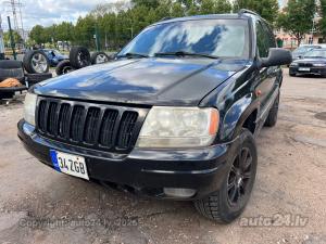 Melns Jeep Grand Cherokee 2004 Narva, ar dzinēja tilpumu 2.70 L un nobraukumu 370 tūkst. km par 599 €, foto  vietnē AUTOMOTO.COM.LV