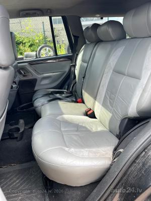 Melns Jeep Grand Cherokee 2004 Narva, ar dzinēja tilpumu 2.70 L un nobraukumu 370 tūkst. km par 599 €, foto 10 vietnē AUTOMOTO.COM.LV