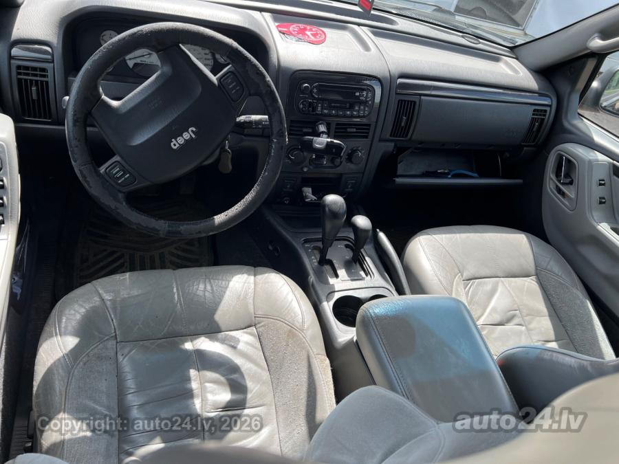 Melns Jeep Grand Cherokee 2004 Narva, ar dzinēja tilpumu 2.70 L un nobraukumu 370 tūkst. km par 599 €, foto 11 vietnē AUTOMOTO.COM.LV