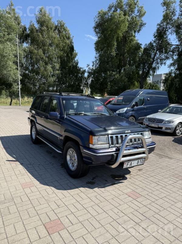 Blue Jeep Grand Cherokee 1994 in Liepaja, with an engine capacity of 4.00 L and mileage of 280 thousand km for 2450 €, photo 1 on AUTOMOTO.COM.LV