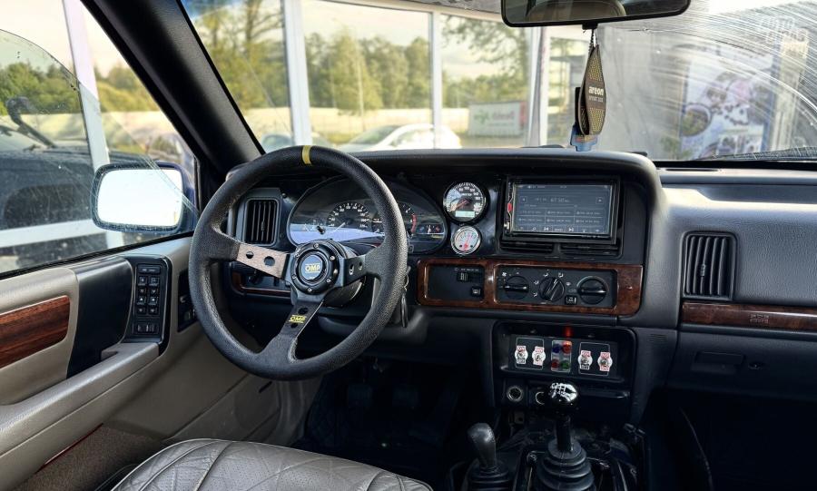 Blue Jeep Grand Cherokee 1996 in Radviliskis, with an engine capacity of 3.00 L and mileage of 400 thousand km for 16500 €, photo 19 on AUTOMOTO.COM.LV
