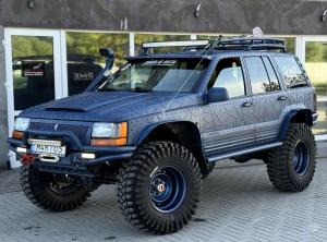 Zils Jeep Grand Cherokee 1996 Radviliškis, ar dzinēja tilpumu 3.00 L un nobraukumu 400 tūkst. km par 15500 €, foto  vietnē AUTOMOTO.COM.LV