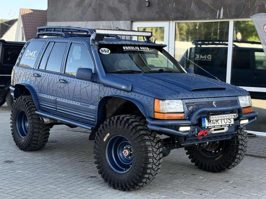 Zils Jeep Grand Cherokee 1996 Radviliškis, ar dzinēja tilpumu 3.00 L un nobraukumu 400 tūkst. km par 15500 €, foto 3 vietnē AUTOMOTO.COM.LV