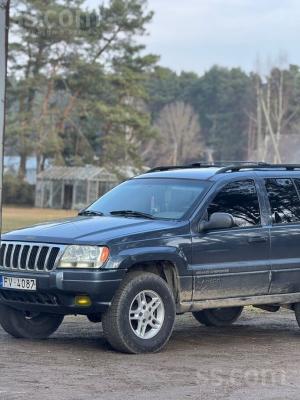 Zils Jeep Grand Cherokee 2000 Rīga, ar dzinēja tilpumu 4.70 L un nobraukumu 256 tūkst. km par 2050 €, foto 5 vietnē AUTOMOTO.COM.LV
