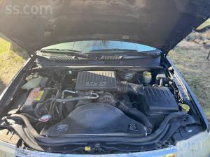 Zils Jeep Grand Cherokee 2000 Rīga, ar dzinēja tilpumu 4.70 L un nobraukumu 256 tūkst. km par 2050 €, foto 11 vietnē AUTOMOTO.COM.LV