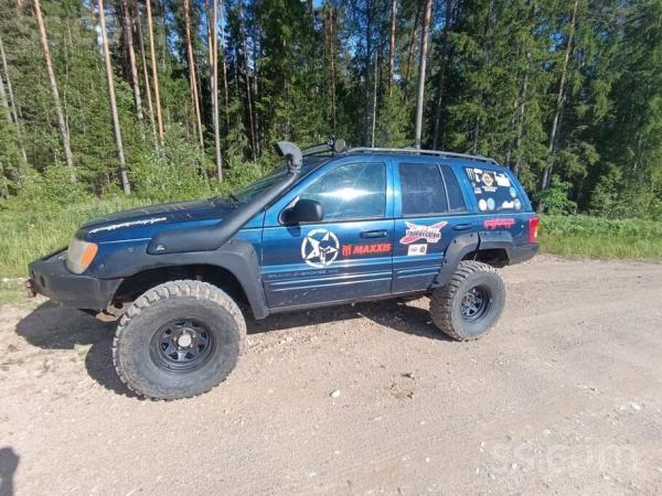 Zils Jeep Grand Cherokee 2000 Valka, ar dzinēja tilpumu 4.70 L un nobraukumu 262 tūkst. km par 6000 €, foto 1 vietnē AUTOMOTO.COM.LV