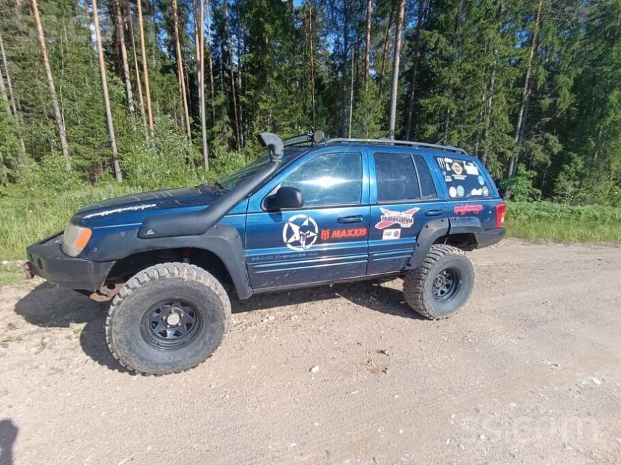 Blue Jeep Grand Cherokee 2000 in Valka, with an engine capacity of 4.70 L and mileage of 262 thousand km for 6000 €, photo 1 on AUTOMOTO.COM.LV