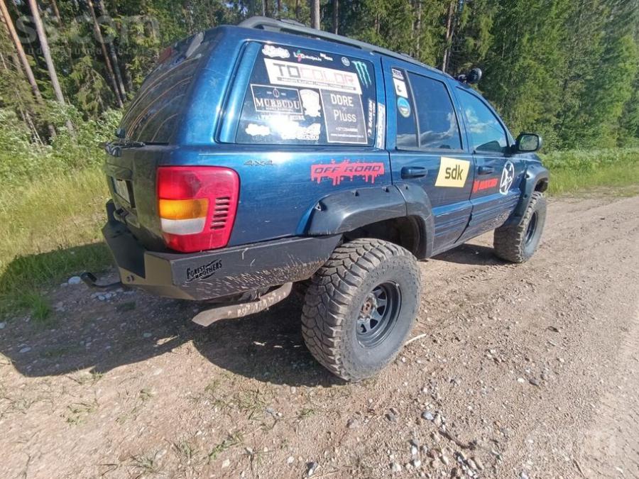 Blue Jeep Grand Cherokee 2000 in Valka, with an engine capacity of 4.70 L and mileage of 262 thousand km for 6000 €, photo 6 on AUTOMOTO.COM.LV
