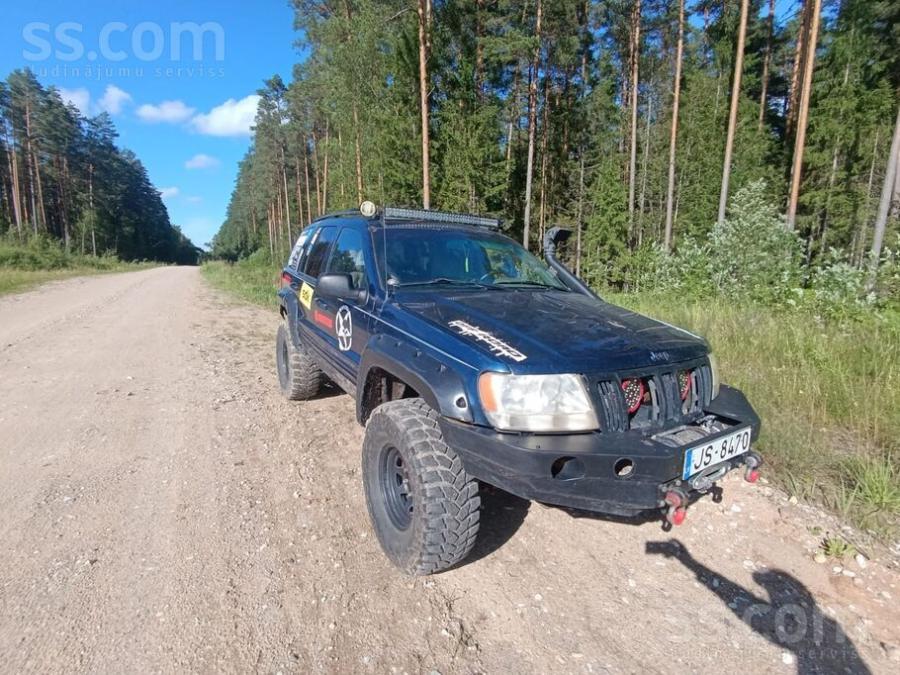 Blue Jeep Grand Cherokee 2000 in Valka, with an engine capacity of 4.70 L and mileage of 262 thousand km for 6000 €, photo 7 on AUTOMOTO.COM.LV