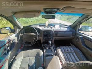Blue Jeep Grand Cherokee 2000 in Valka, with an engine capacity of 4.70 L and mileage of 262 thousand km for 6000 €, photo 10 on AUTOMOTO.COM.LV
