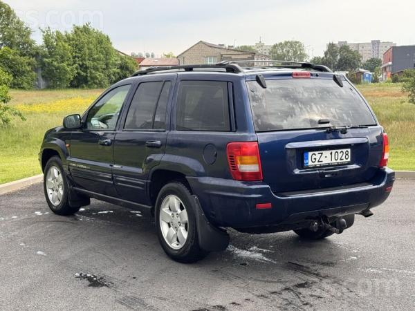 Zils Jeep Grand Cherokee 2002 Liepāja, ar dzinēja tilpumu 4.70 L un nobraukumu 287 tūkst. km par 2800 €, foto 4 vietnē AUTOMOTO.COM.LV