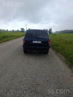 Blue Jeep Grand Cherokee 2002 in Aizkraukle, with an engine capacity of 2.70 L and mileage of 339 thousand km for 2500 €, photo 5 on AUTOMOTO.COM.LV