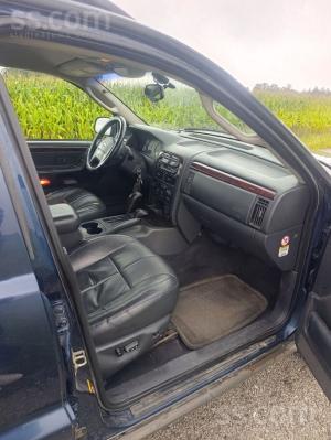 Blue Jeep Grand Cherokee 2002 in Aizkraukle, with an engine capacity of 2.70 L and mileage of 339 thousand km for 2500 €, photo 6 on AUTOMOTO.COM.LV