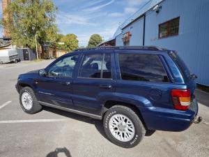 Zils Jeep Grand Cherokee 2002 Tallina, ar dzinēja tilpumu 2.70 L un nobraukumu 341 tūkst. km par 3800 €, foto 13 vietnē AUTOMOTO.COM.LV