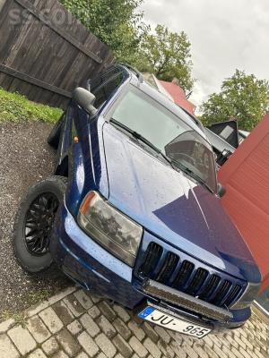 Zils Jeep Grand Cherokee 2002 Valmiera, ar dzinēja tilpumu 2.70 L un nobraukumu 354 tūkst. km par 4400 €, foto 3 vietnē AUTOMOTO.COM.LV