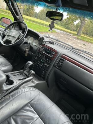 Zils Jeep Grand Cherokee 2002 Valmiera, ar dzinēja tilpumu 2.70 L un nobraukumu 354 tūkst. km par 4400 €, foto 8 vietnē AUTOMOTO.COM.LV