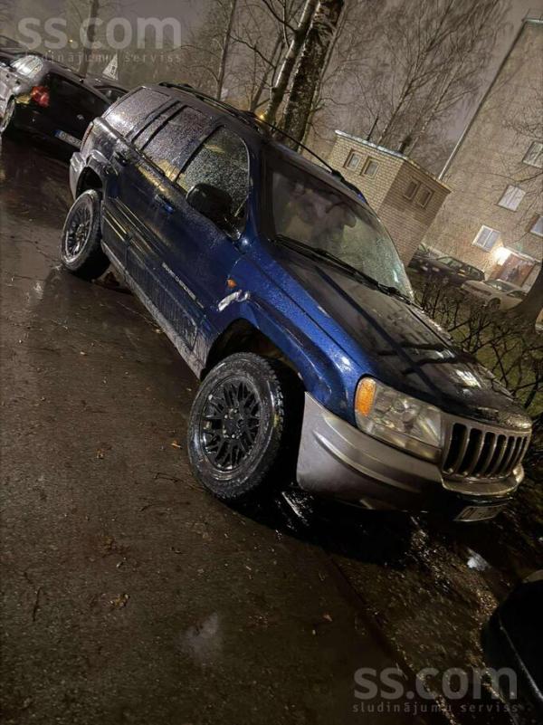 Blue Jeep Grand Cherokee 2003 in Riga, with an engine capacity of 2.70 L and mileage of 257 thousand km for 2700 €, photo 1 on AUTOMOTO.COM.LV