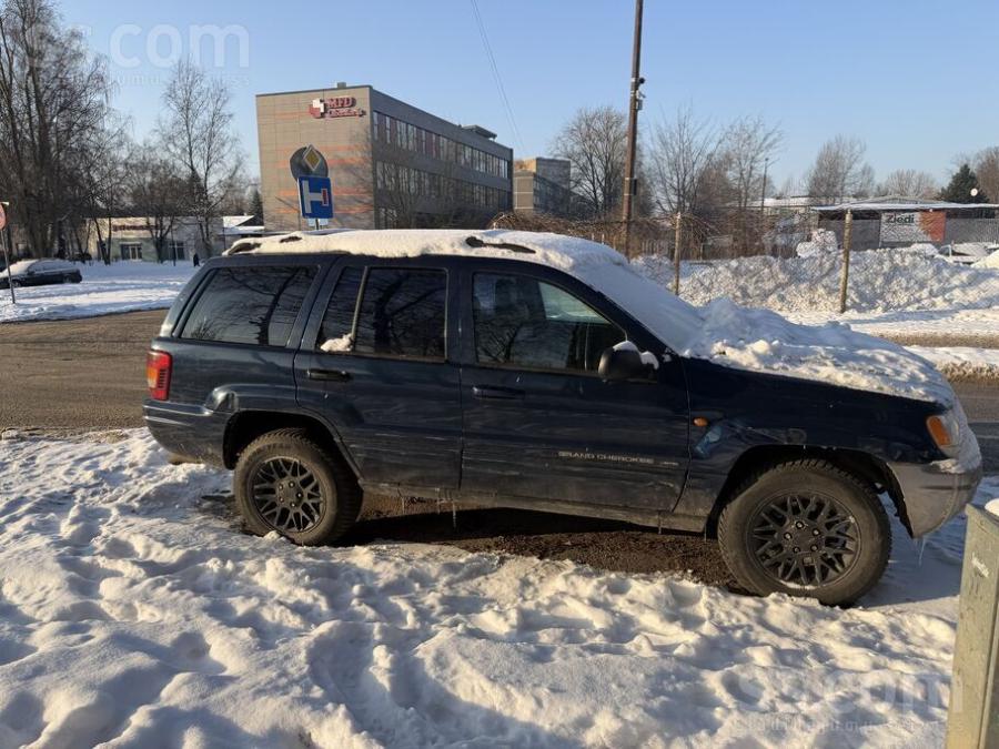 Blue Jeep Grand Cherokee 2003 in Riga, with an engine capacity of 2.70 L and mileage of 257 thousand km for 2700 €, photo 7 on AUTOMOTO.COM.LV