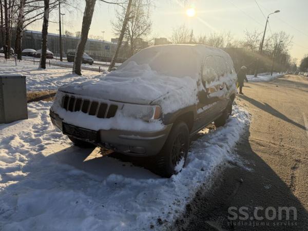 Blue Jeep Grand Cherokee 2003 in Riga, with an engine capacity of 2.70 L and mileage of 257 thousand km for 2700 €, photo 8 on AUTOMOTO.COM.LV