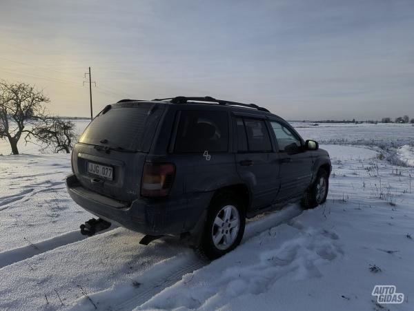 Zils Jeep Grand Cherokee 2003 Ignalina, ar dzinēja tilpumu 2.70 L un nobraukumu 355 tūkst. km par 3650 €, foto 7 vietnē AUTOMOTO.COM.LV