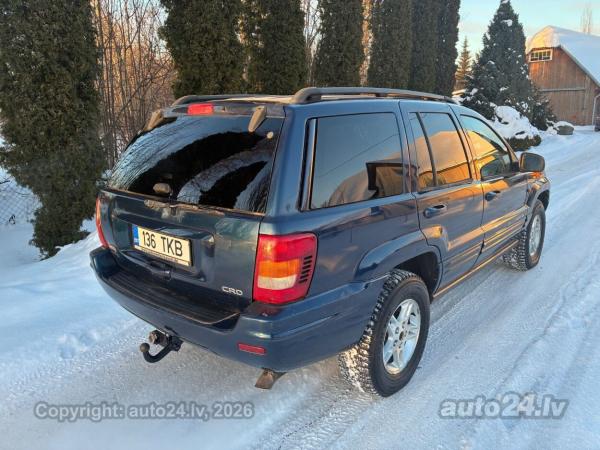 Zils Jeep Grand Cherokee 2003 Tallina, ar dzinēja tilpumu 2.70 L un nobraukumu 420 tūkst. km par 3600 €, foto 5 vietnē AUTOMOTO.COM.LV