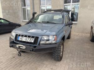 Zils Jeep Grand Cherokee 2003 Rēzekne, ar dzinēja tilpumu 2.70 L un nobraukumu 347 tūkst. km par 5600 €, foto 3 vietnē AUTOMOTO.COM.LV